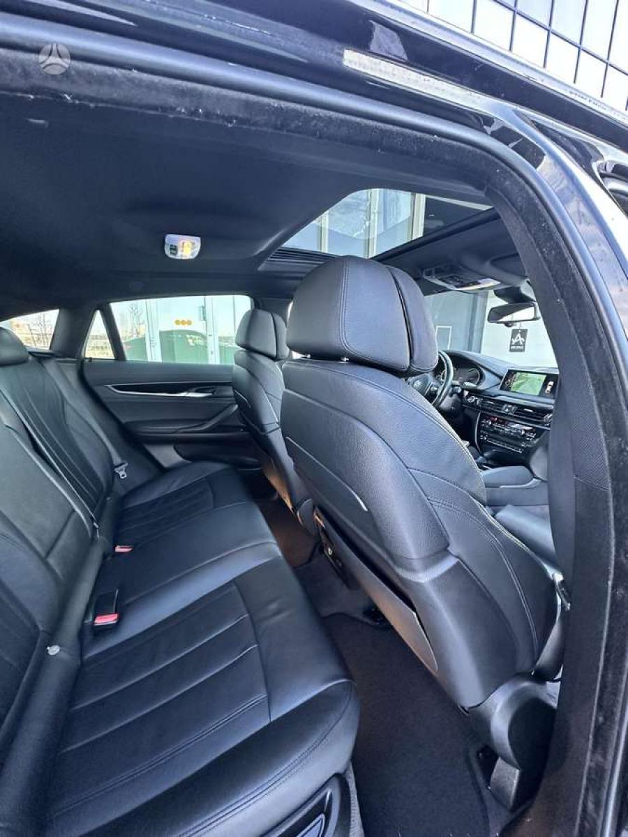 Black BMW X6 2016 in Vilnius, with an engine capacity of 2.99 L and mileage of 260 thousand km for 24700 €, photo 16 on AUTOMOTO.COM.LV