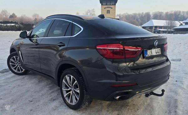 Black BMW X6 2016 in Vilnius, with an engine capacity of 4.40 L and mileage of 260 thousand km for 15800 €, photo 5 on AUTOMOTO.COM.LV