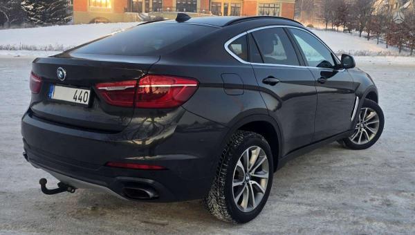 Black BMW X6 2016 in Vilnius, with an engine capacity of 4.40 L and mileage of 260 thousand km for 15800 €, photo 7 on AUTOMOTO.COM.LV