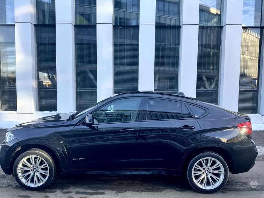 Black BMW X6 2016 in Vilnius, with an engine capacity of 2.99 L and mileage of 261 thousand km for 23999 €, photo 6 on AUTOMOTO.COM.LV