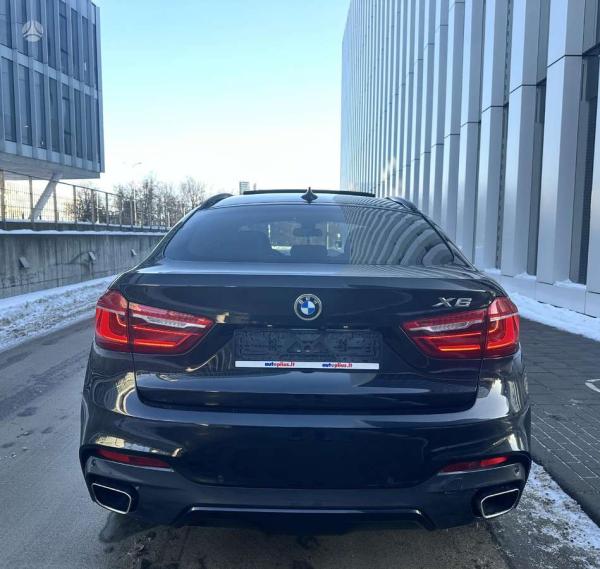 Black BMW X6 2016 in Vilnius, with an engine capacity of 2.99 L and mileage of 261 thousand km for 23999 €, photo 8 on AUTOMOTO.COM.LV