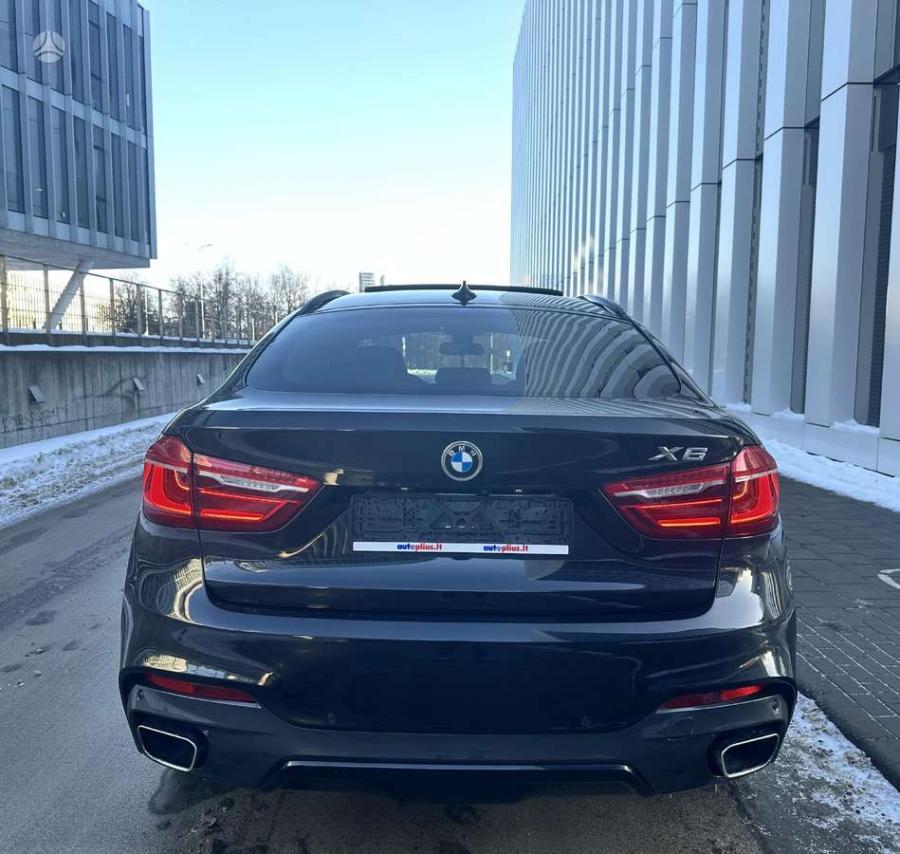 Black BMW X6 2016 in Vilnius, with an engine capacity of 2.99 L and mileage of 261 thousand km for 23999 €, photo 8 on AUTOMOTO.COM.LV