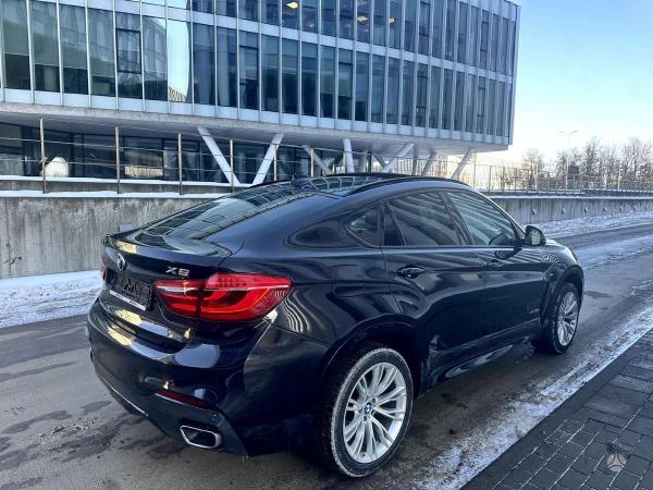 Black BMW X6 2016 in Vilnius, with an engine capacity of 2.99 L and mileage of 261 thousand km for 23999 €, photo 9 on AUTOMOTO.COM.LV