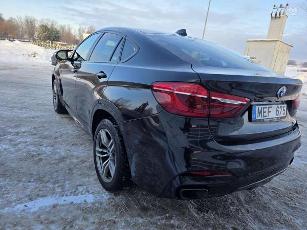 Black BMW X6 2016 in Kretinga, with an engine capacity of 2.99 L and mileage of 265 thousand km for 22800 €, photo 7 on AUTOMOTO.COM.LV