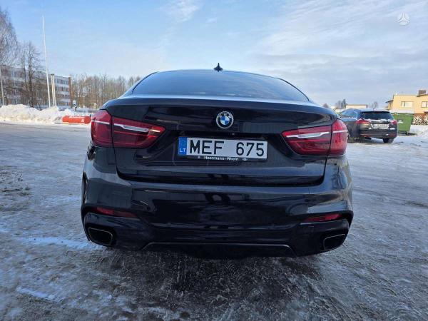 Black BMW X6 2016 in Kretinga, with an engine capacity of 2.99 L and mileage of 269 thousand km for 22800 €, photo 5 on AUTOMOTO.COM.LV