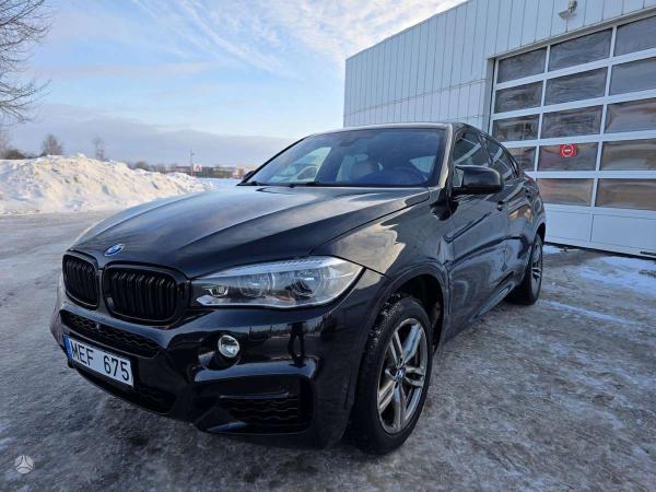Black BMW X6 2016 in Kretinga, with an engine capacity of 2.99 L and mileage of 269 thousand km for 22800 €, photo 8 on AUTOMOTO.COM.LV