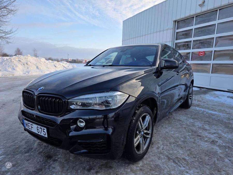 Black BMW X6 2016 in Kretinga, with an engine capacity of 2.99 L and mileage of 269 thousand km for 22800 €, photo 8 on AUTOMOTO.COM.LV
