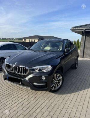 Black BMW X6 2016 in Vilnius, with an engine capacity of 4.40 L and mileage of 260 thousand km for 15500 €, photo  on AUTOMOTO.COM.LV