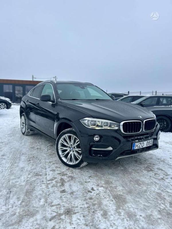 Black BMW X6 2016 in Kaunas, with an engine capacity of 2.99 L and mileage of 190 thousand km for 23200 €, photo 4 on AUTOMOTO.COM.LV