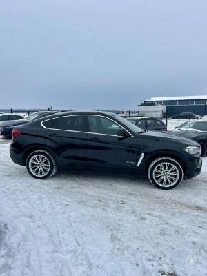 Black BMW X6 2016 in Kaunas, with an engine capacity of 2.99 L and mileage of 190 thousand km for 23200 €, photo 7 on AUTOMOTO.COM.LV