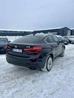 Black BMW X6 2016 in Kaunas, with an engine capacity of 2.99 L and mileage of 190 thousand km for 23200 €, photo 8 on AUTOMOTO.COM.LV