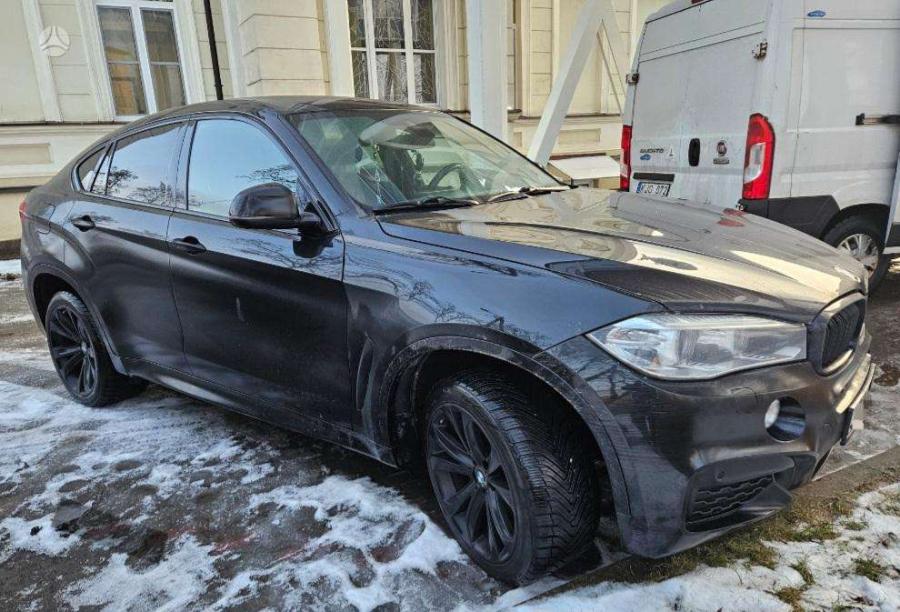 Black BMW X6 2016 in Vilnius, with an engine capacity of 2.99 L and mileage of 207 thousand km for 27000 €, photo 1 on AUTOMOTO.COM.LV