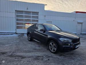 Black BMW X6 2016 in Kretinga, with an engine capacity of 2.99 L and mileage of 269 thousand km for 22700 €, photo 11 on AUTOMOTO.COM.LV