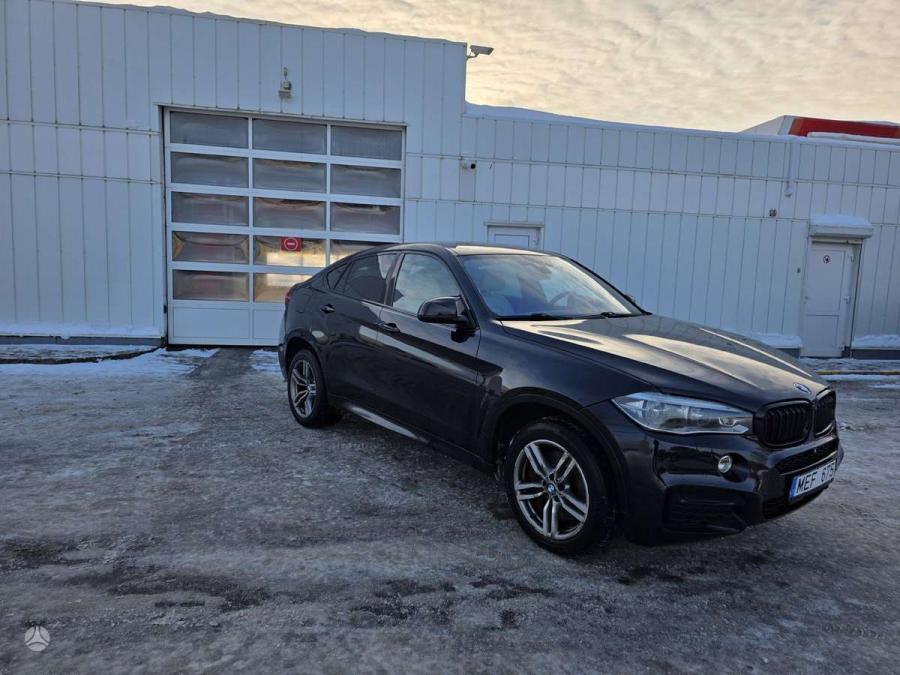 Black BMW X6 2016 in Kretinga, with an engine capacity of 2.99 L and mileage of 269 thousand km for 22700 €, photo 11 on AUTOMOTO.COM.LV