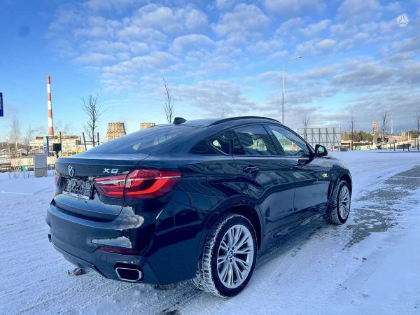 Black BMW X6 2016 in Vilnius, with an engine capacity of 2.99 L and mileage of 259 thousand km for 23999 €, photo 7 on AUTOMOTO.COM.LV