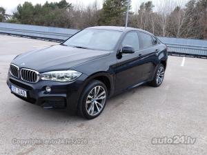 Black BMW X6 2016 in Tallinn, with an engine capacity of 3.00 L and mileage of 231 thousand km for 30500 €, photo 4 on AUTOMOTO.COM.LV
