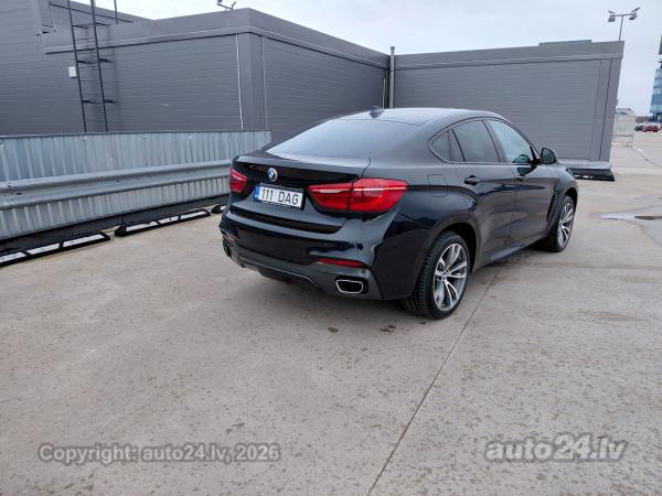 Black BMW X6 2016 in Tallinn, with an engine capacity of 3.00 L and mileage of 231 thousand km for 30500 €, photo 4 on AUTOMOTO.COM.LV