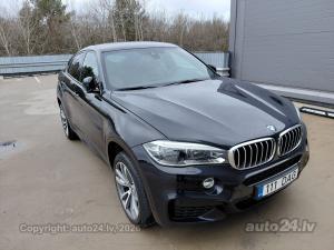 Black BMW X6 2016 in Tallinn, with an engine capacity of 3.00 L and mileage of 231 thousand km for 30500 €, photo 8 on AUTOMOTO.COM.LV