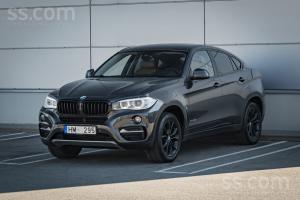 Black BMW X6 2016 in Riga, with an engine capacity of 3.00 L and mileage of 192 thousand km for 20990 €, photo  on AUTOMOTO.COM.LV
