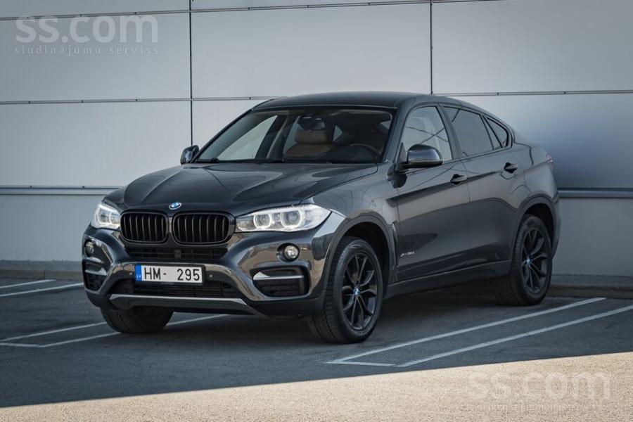 Black BMW X6 2016 in Riga, with an engine capacity of 3.00 L and mileage of 192 thousand km for 20990 €, photo 1 on AUTOMOTO.COM.LV
