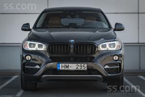 Black BMW X6 2016 in Riga, with an engine capacity of 3.00 L and mileage of 192 thousand km for 20990 €, photo 3 on AUTOMOTO.COM.LV