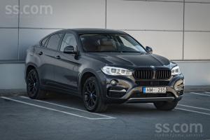 Black BMW X6 2016 in Riga, with an engine capacity of 3.00 L and mileage of 192 thousand km for 20990 €, photo 4 on AUTOMOTO.COM.LV