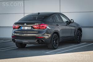 Black BMW X6 2016 in Riga, with an engine capacity of 3.00 L and mileage of 192 thousand km for 20990 €, photo 5 on AUTOMOTO.COM.LV