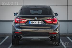 Black BMW X6 2016 in Riga, with an engine capacity of 3.00 L and mileage of 192 thousand km for 20990 €, photo 6 on AUTOMOTO.COM.LV