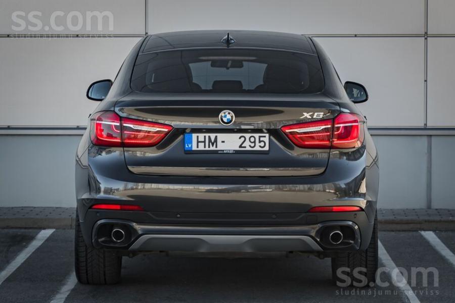 Black BMW X6 2016 in Riga, with an engine capacity of 3.00 L and mileage of 192 thousand km for 20990 €, photo 6 on AUTOMOTO.COM.LV