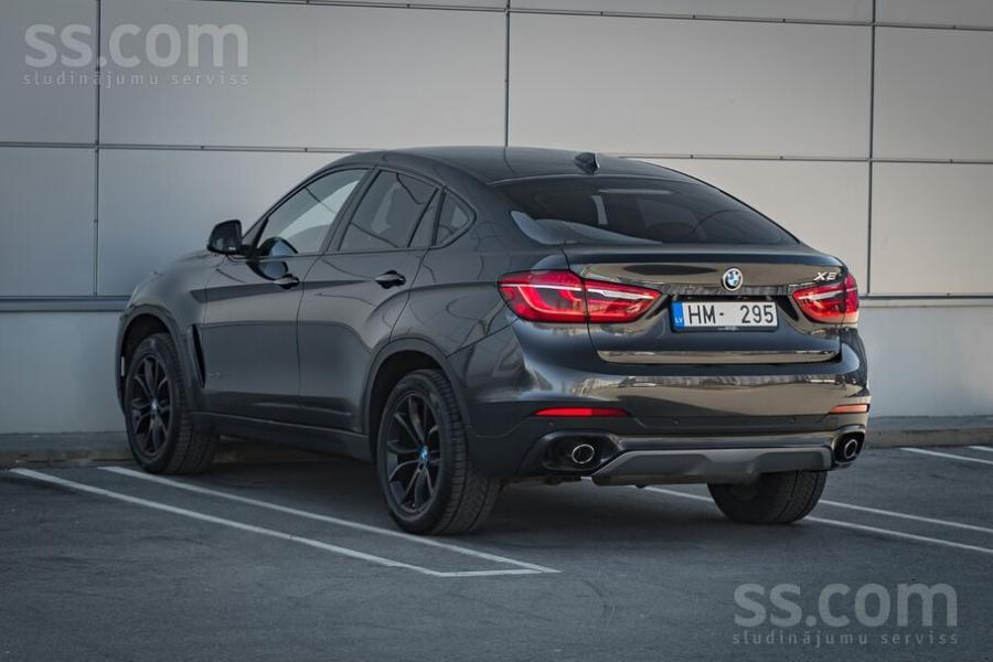 Black BMW X6 2016 in Riga, with an engine capacity of 3.00 L and mileage of 192 thousand km for 20990 €, photo 7 on AUTOMOTO.COM.LV