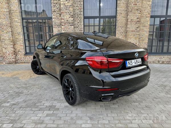 Black BMW X6 2016 in Riga, with an engine capacity of 3.00 L and mileage of 247 thousand km for 22500 €, photo 3 on AUTOMOTO.COM.LV