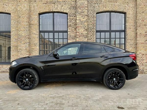 Black BMW X6 2016 in Riga, with an engine capacity of 3.00 L and mileage of 247 thousand km for 22500 €, photo 5 on AUTOMOTO.COM.LV