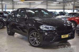 Black BMW X6 2016 in Riga, with an engine capacity of 3.00 L and mileage of 276 thousand km for 20900 €, photo  on AUTOMOTO.COM.LV
