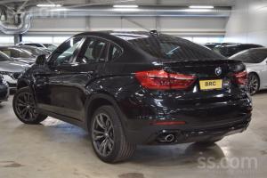 Black BMW X6 2016 in Riga, with an engine capacity of 3.00 L and mileage of 276 thousand km for 20900 €, photo 3 on AUTOMOTO.COM.LV