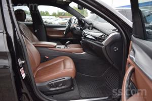 Black BMW X6 2016 in Riga, with an engine capacity of 3.00 L and mileage of 276 thousand km for 20900 €, photo 14 on AUTOMOTO.COM.LV