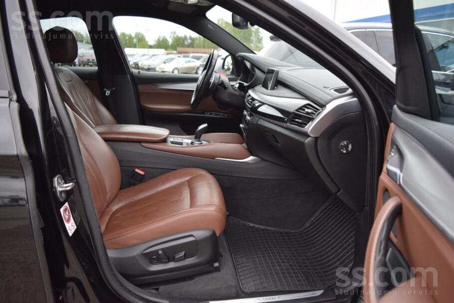 Black BMW X6 2016 in Riga, with an engine capacity of 3.00 L and mileage of 276 thousand km for 20900 €, photo 14 on AUTOMOTO.COM.LV