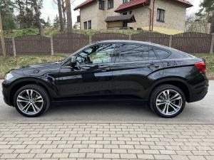 Black BMW X6 2016 in Riga, with an engine capacity of 3.00 L and mileage of 146 thousand km for 22000 €, photo 3 on AUTOMOTO.COM.LV