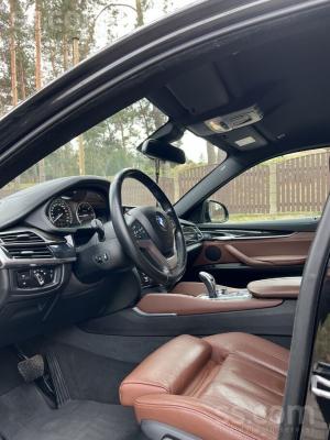 Black BMW X6 2016 in Riga, with an engine capacity of 3.00 L and mileage of 146 thousand km for 22000 €, photo 5 on AUTOMOTO.COM.LV