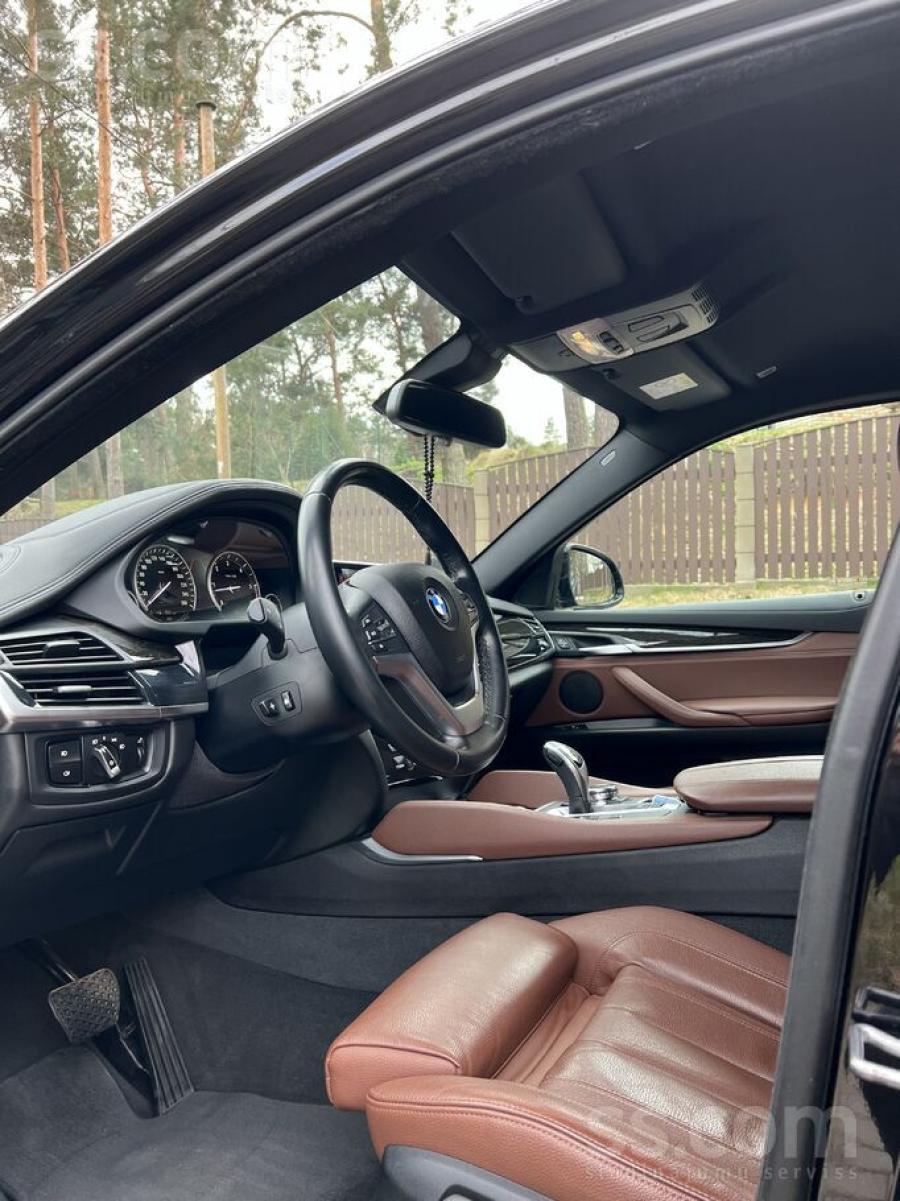 Black BMW X6 2016 in Riga, with an engine capacity of 3.00 L and mileage of 146 thousand km for 22000 €, photo 5 on AUTOMOTO.COM.LV