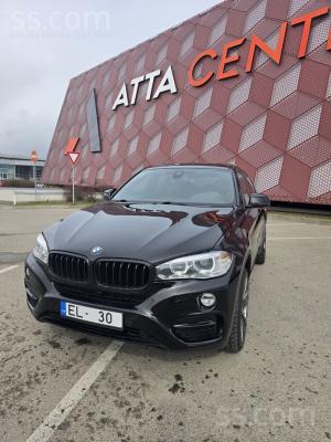 Black BMW X6 2016 in Riga, with an engine capacity of 3.00 L and mileage of 275 thousand km for 22900 €, photo  on AUTOMOTO.COM.LV