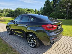 Black BMW X6 2016 in Telschi, with an engine capacity of 2.99 L and mileage of 260 thousand km for 24500 €, photo 13 on AUTOMOTO.COM.LV