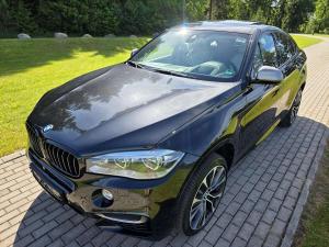 Black BMW X6 2016 in Telschi, with an engine capacity of 2.99 L and mileage of 260 thousand km for 24500 €, photo 22 on AUTOMOTO.COM.LV