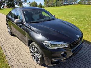 Black BMW X6 2016 in Telschi, with an engine capacity of 2.99 L and mileage of 260 thousand km for 24500 €, photo 23 on AUTOMOTO.COM.LV