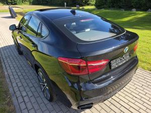 Black BMW X6 2016 in Telschi, with an engine capacity of 2.99 L and mileage of 260 thousand km for 24500 €, photo 25 on AUTOMOTO.COM.LV