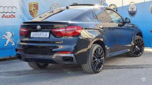 Black BMW X6 2016 in Kaunas, with an engine capacity of 2.99 L and mileage of 269 thousand km for 23900 €, photo 4 on AUTOMOTO.COM.LV