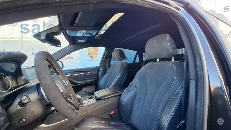 Black BMW X6 2016 in Kaunas, with an engine capacity of 2.99 L and mileage of 269 thousand km for 23900 €, photo 9 on AUTOMOTO.COM.LV