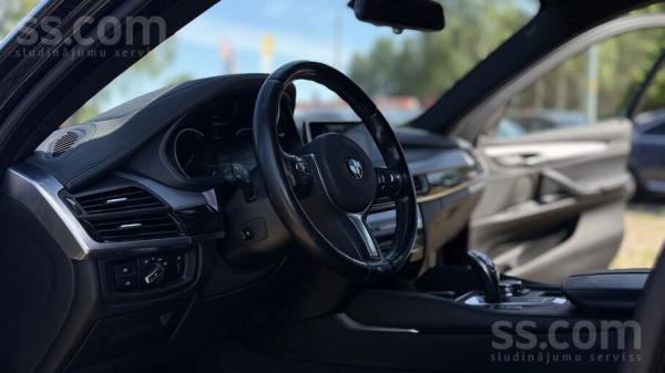 Black BMW X6 2016 in Jelgava, with an engine capacity of 3.00 L and mileage of 201 thousand km for 25990 €, photo 7 on AUTOMOTO.COM.LV