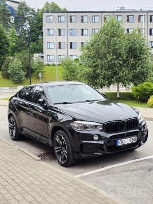 Black BMW X6 2016 in Ogre, with an engine capacity of 3.00 L and mileage of 221 thousand km for 28000 €, photo 3 on AUTOMOTO.COM.LV