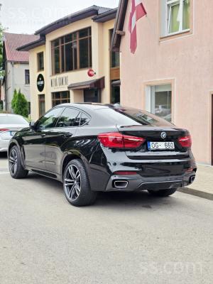 Black BMW X6 2016 in Ogre, with an engine capacity of 3.00 L and mileage of 221 thousand km for 28000 €, photo 4 on AUTOMOTO.COM.LV