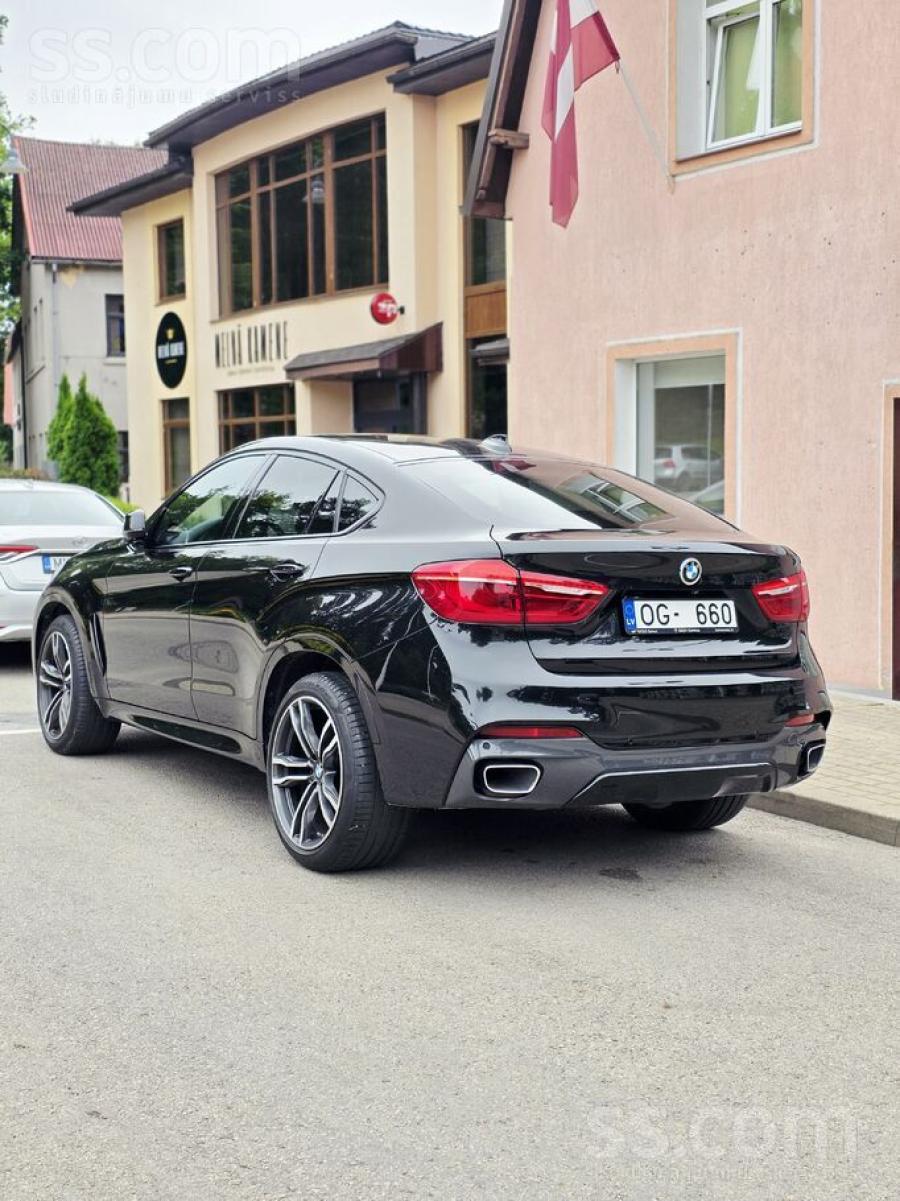 Black BMW X6 2016 in Ogre, with an engine capacity of 3.00 L and mileage of 221 thousand km for 28000 €, photo 4 on AUTOMOTO.COM.LV